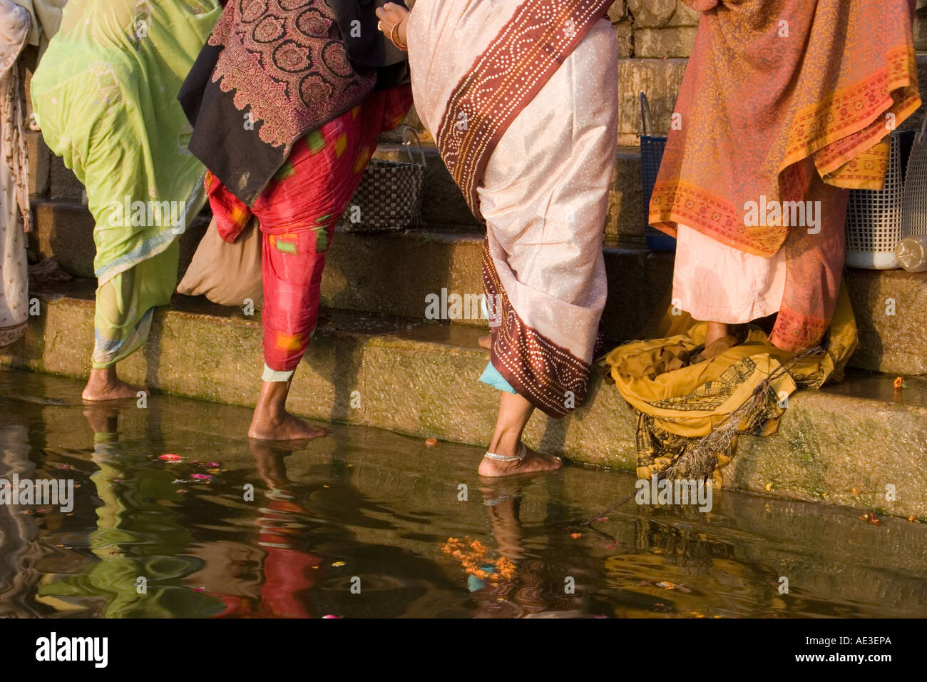 Indian woman bathing in river hi-res stock photography and images - Alamy