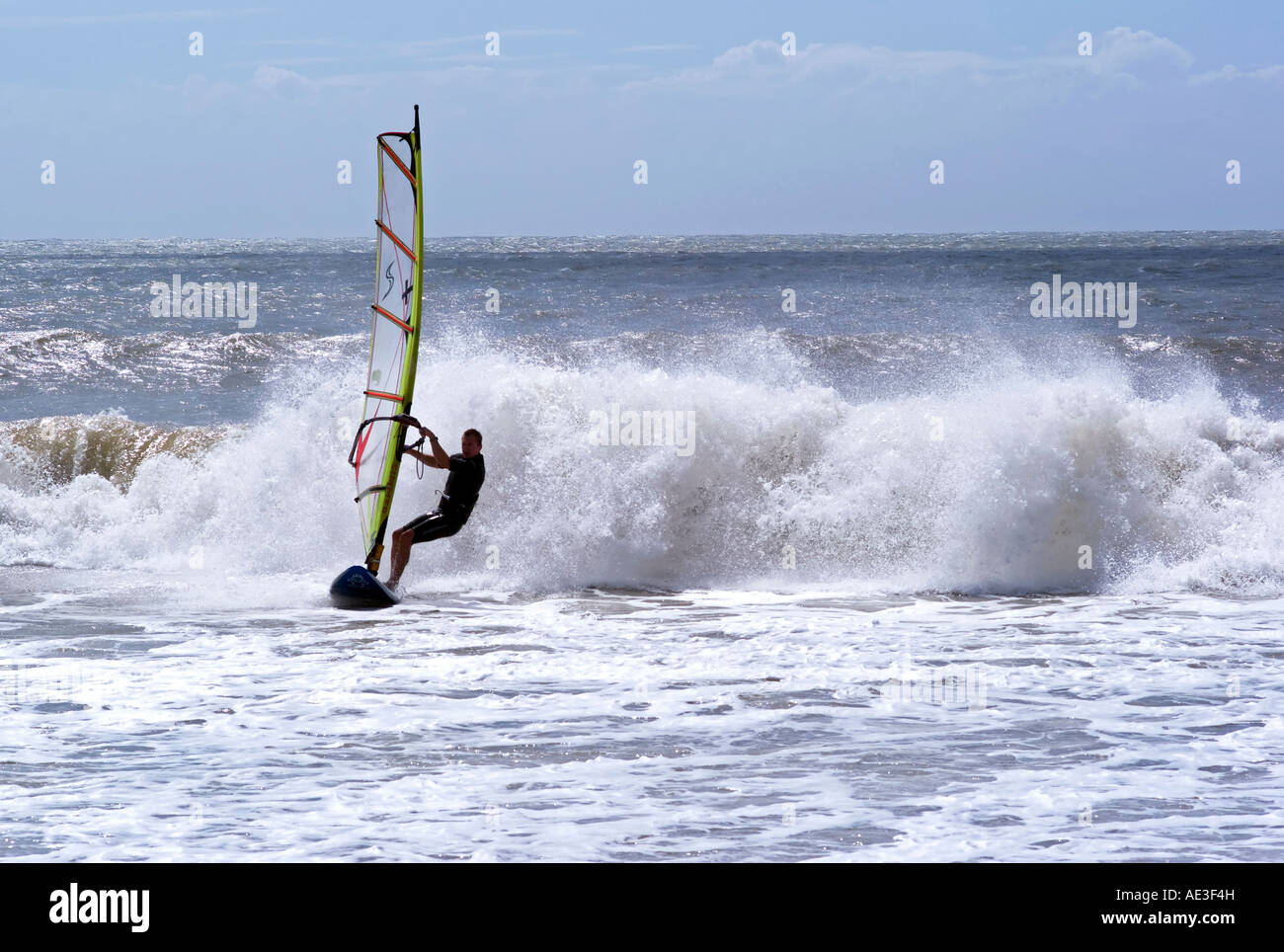Riding the waves Stock Photo - Alamy