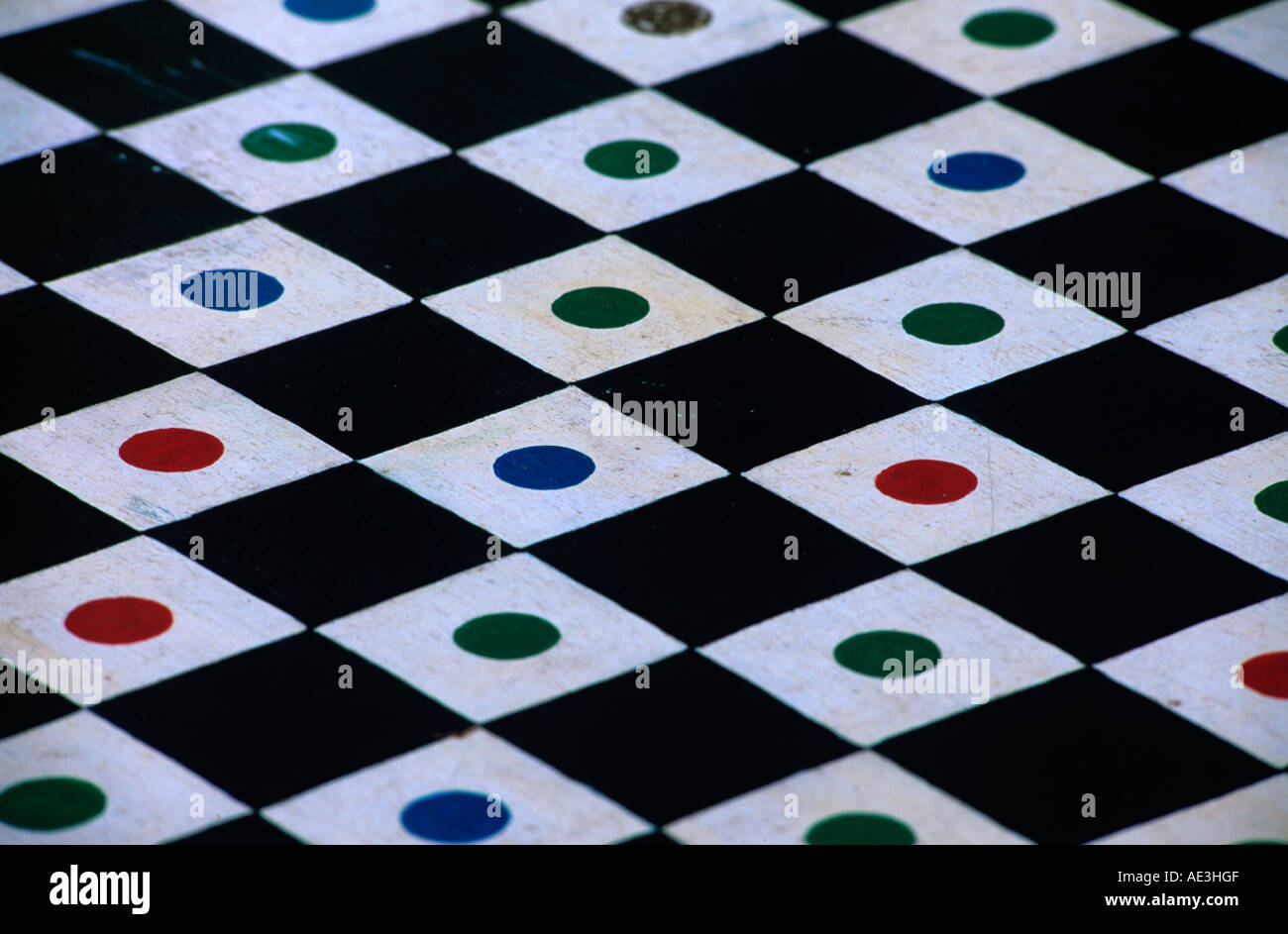 chequered board on gaming/gambling stall at fete/fair showing winning ...