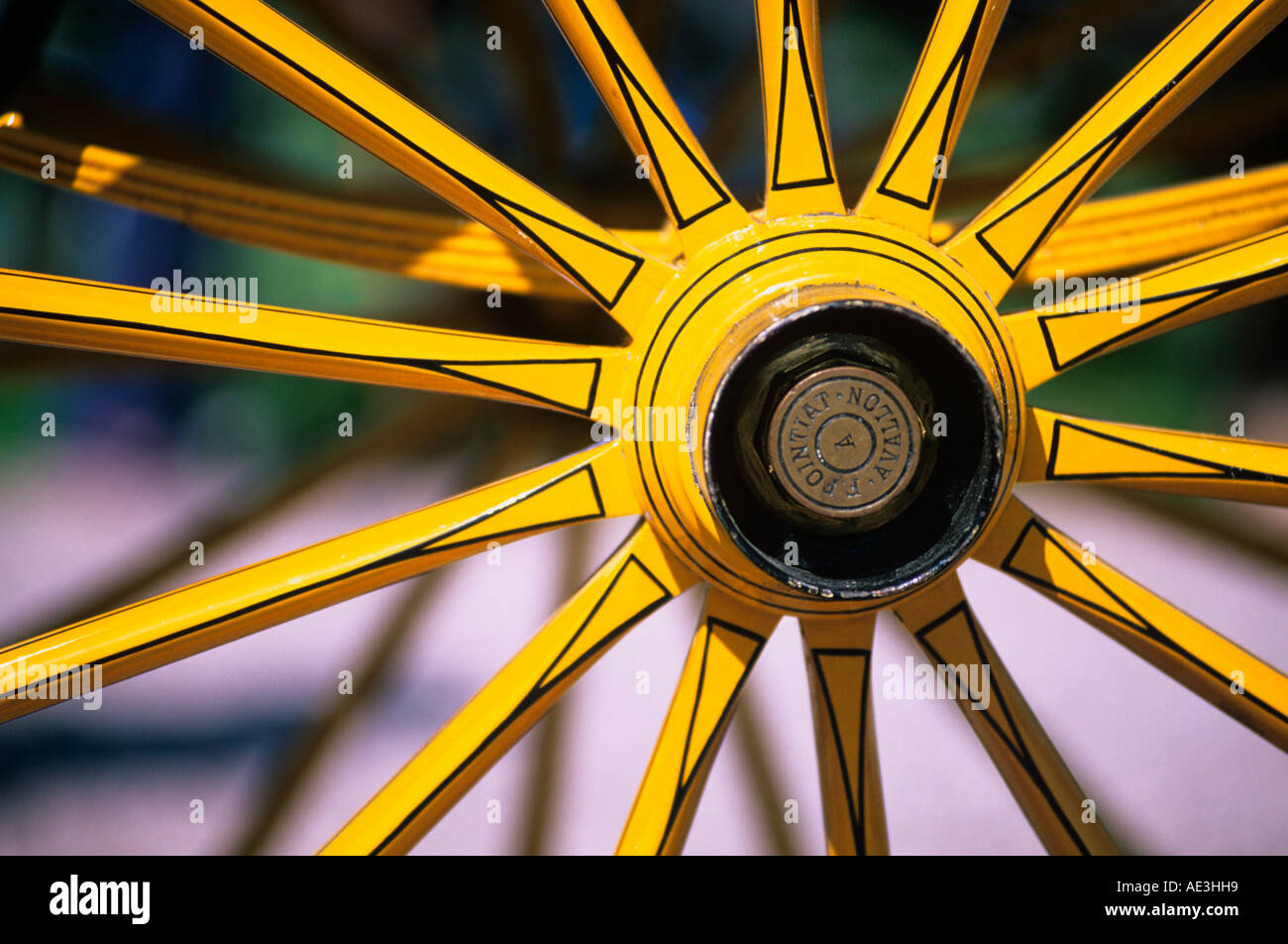 yellow and black painted carriage / cart wheel on horse drawn vehicle ...