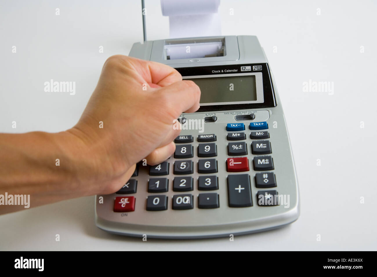 Hand Smashing Calculator Stock Photo - Alamy