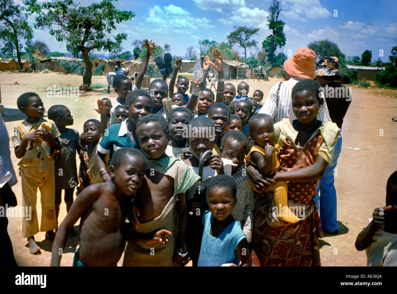 African children waving hi-res stock photography and images - Alamy
