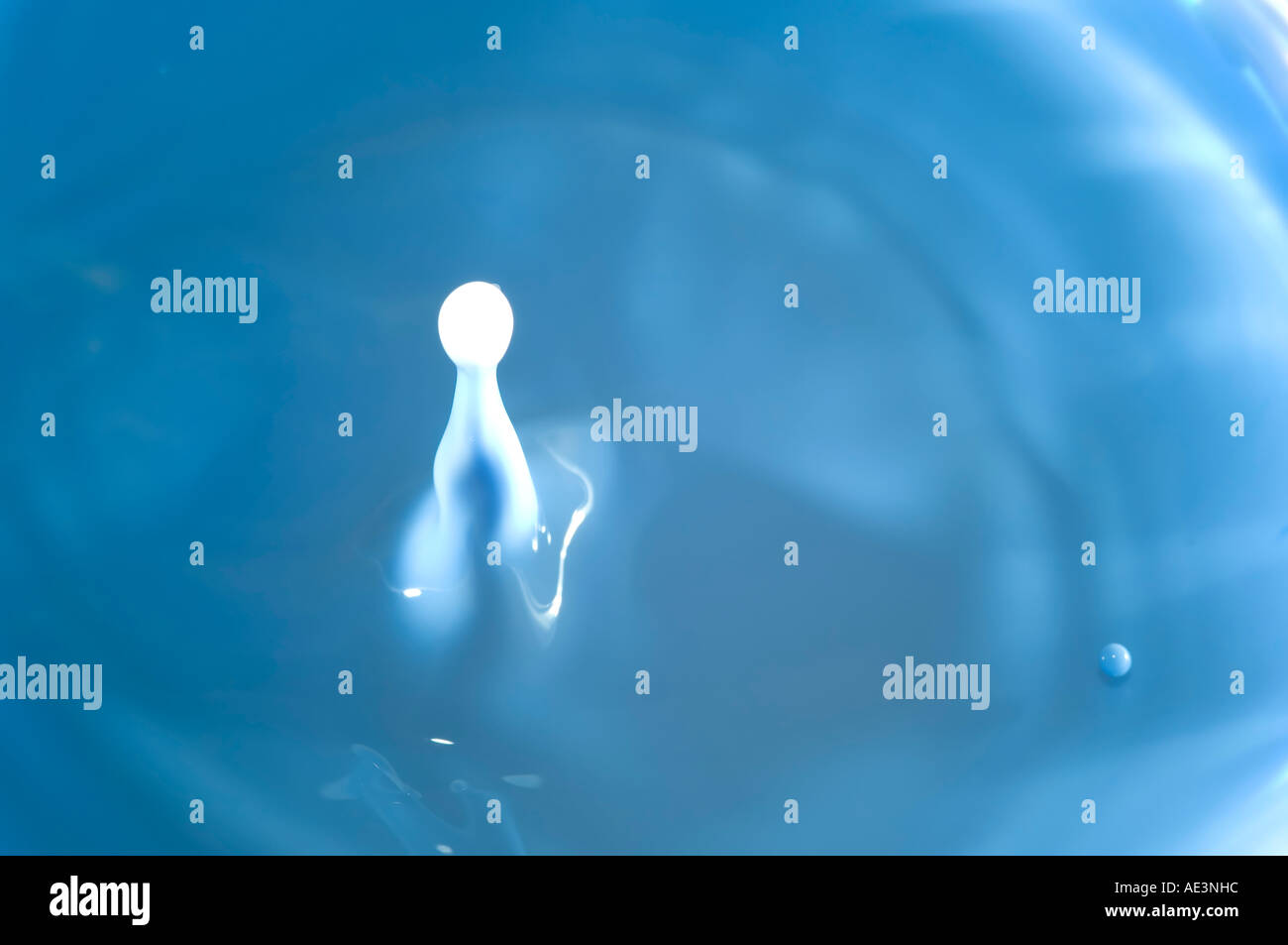 colored fluid drops and ripples Stock Photo - Alamy