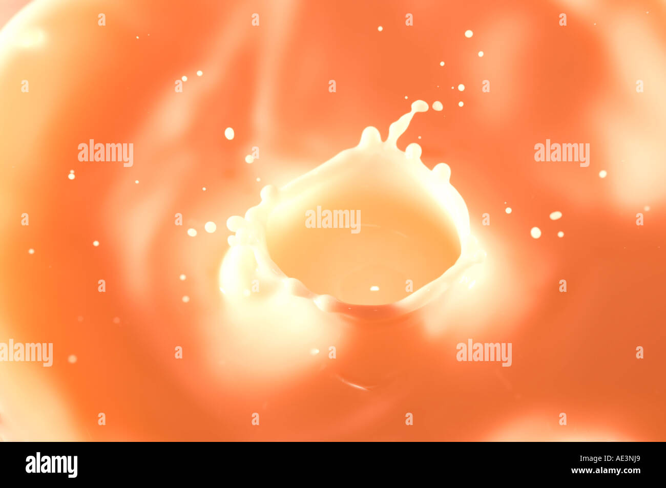 colored fluid drops and ripples Stock Photo - Alamy