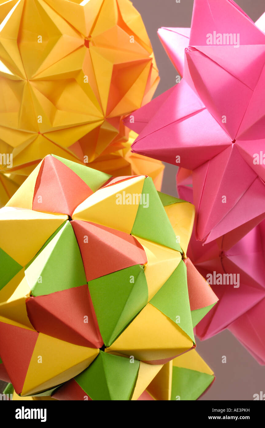 Colorful bright Origami abstract decorative paper figures polyhedrons ...