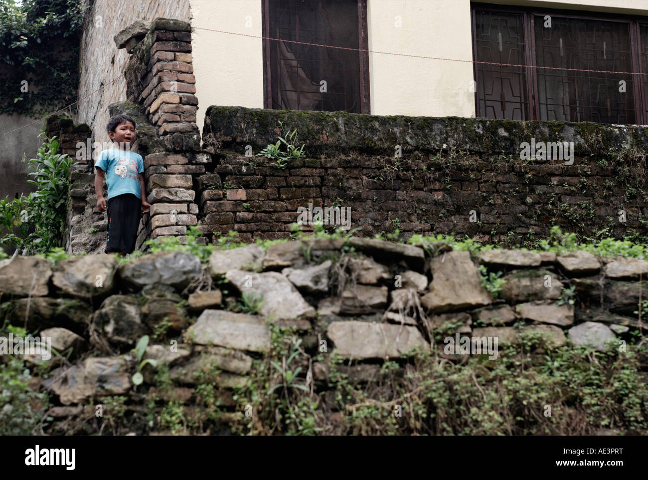 Child crying on Kathmandu street Stock Photo - Alamy