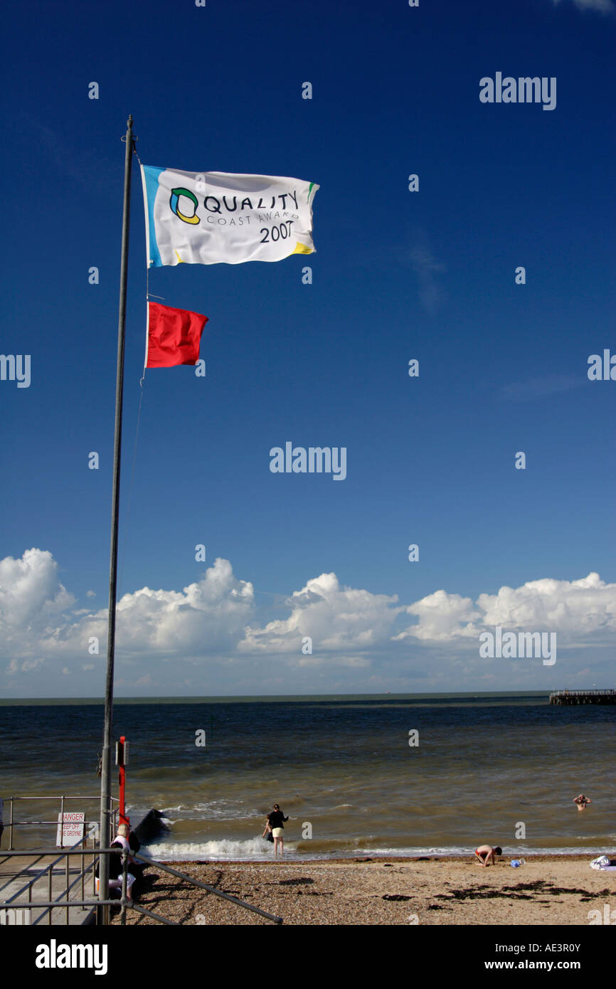 Flag indicating Quality Coast Award 2007 for Clacton-on-Sea against a ...