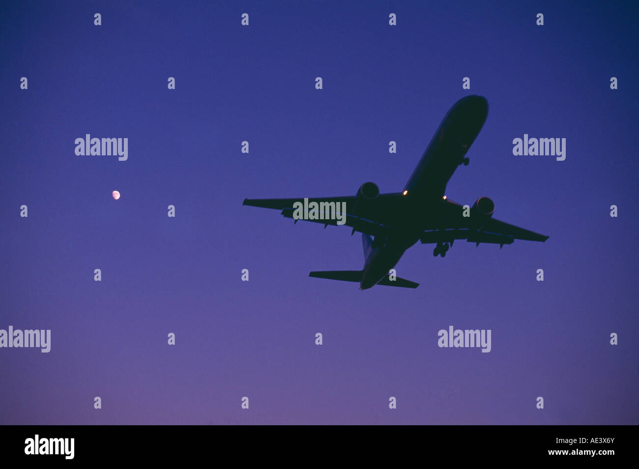 Jumbo jet taking off moon hi-res stock photography and images - Alamy