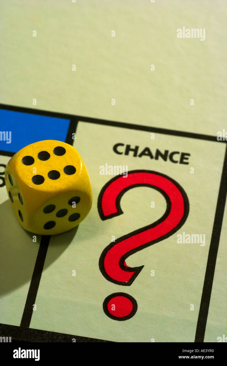 vertical photo of monopoly game board showing chance square and dice ...