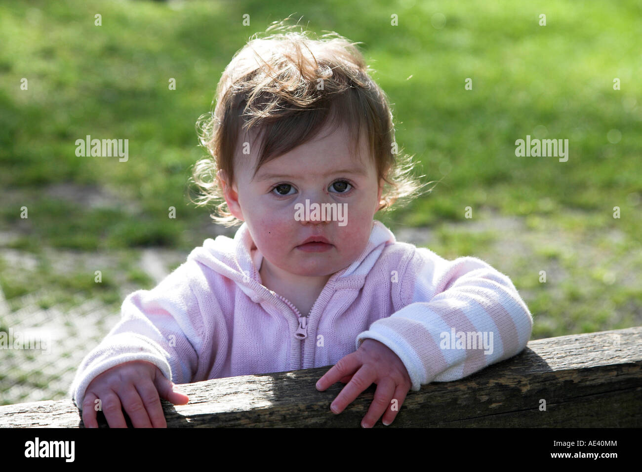 Baby Girl watching,pretty baby Stock Photo - Alamy