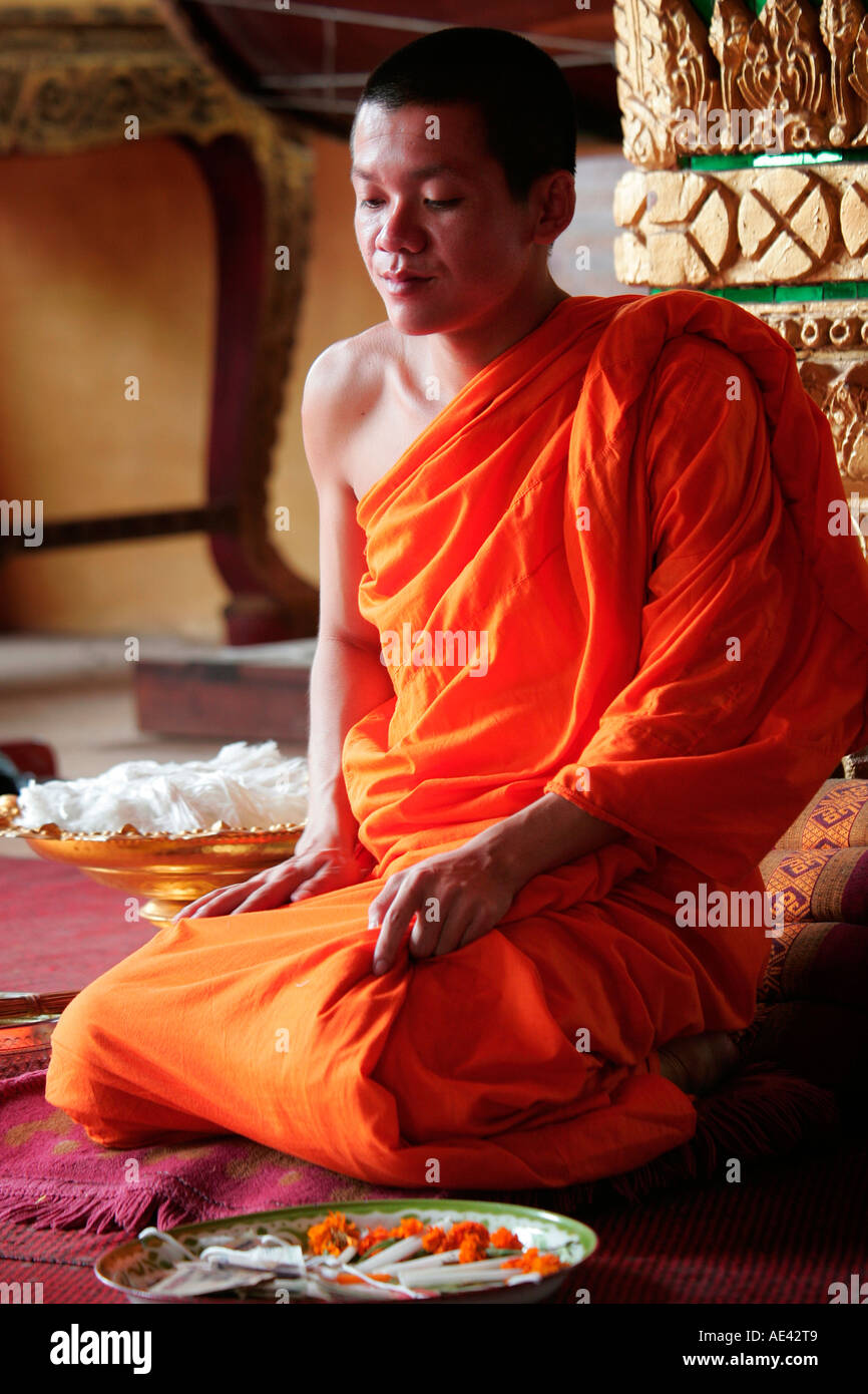 Su Khwan or Baci ceremony at Wat Si Muang, Vientiane, Laos Stock Photo ...