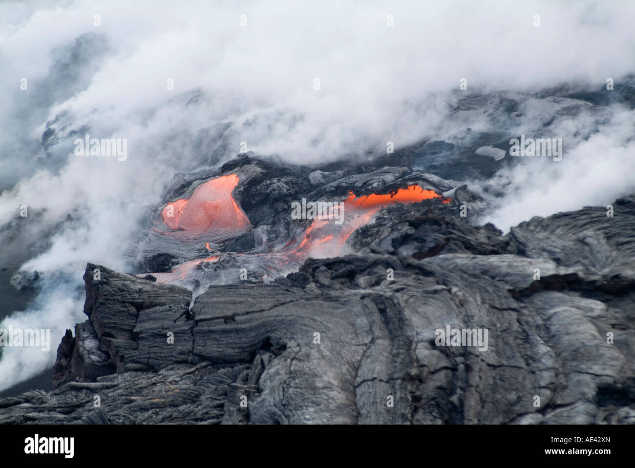 Steam plumes from hot lava, Kilauea Volcano, Hawaii Volcanoes National ...
