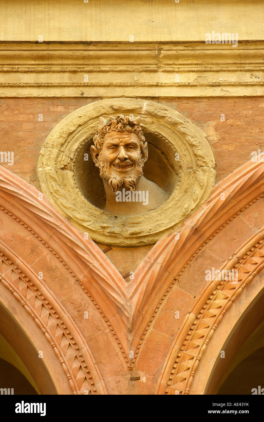 Bologna Italy Architectural motif of a Terracotta head of Bacchus Stock ...