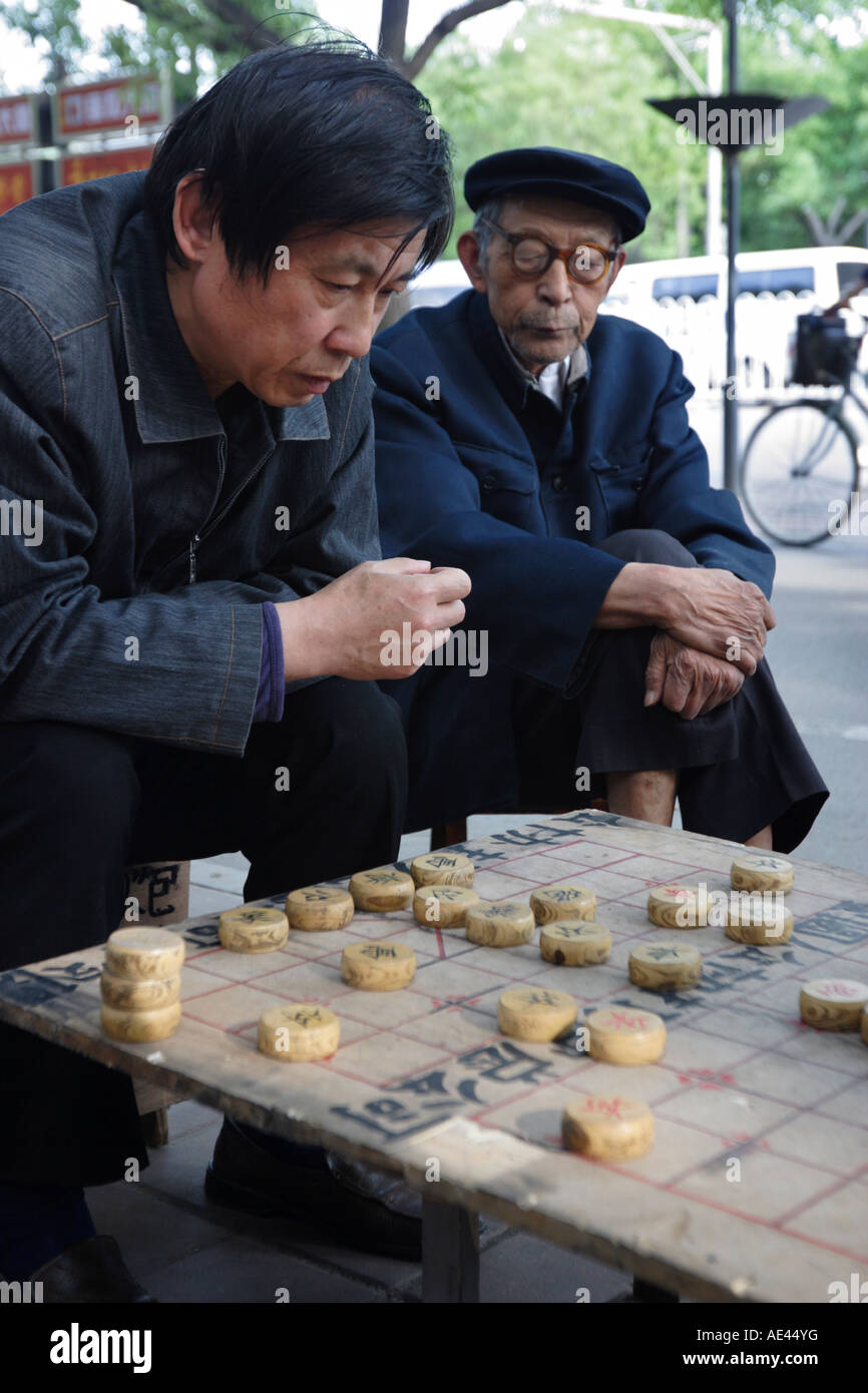 Playing Xiangqi, Chinese Chess, on the streets of Beijing, China, Asia ...