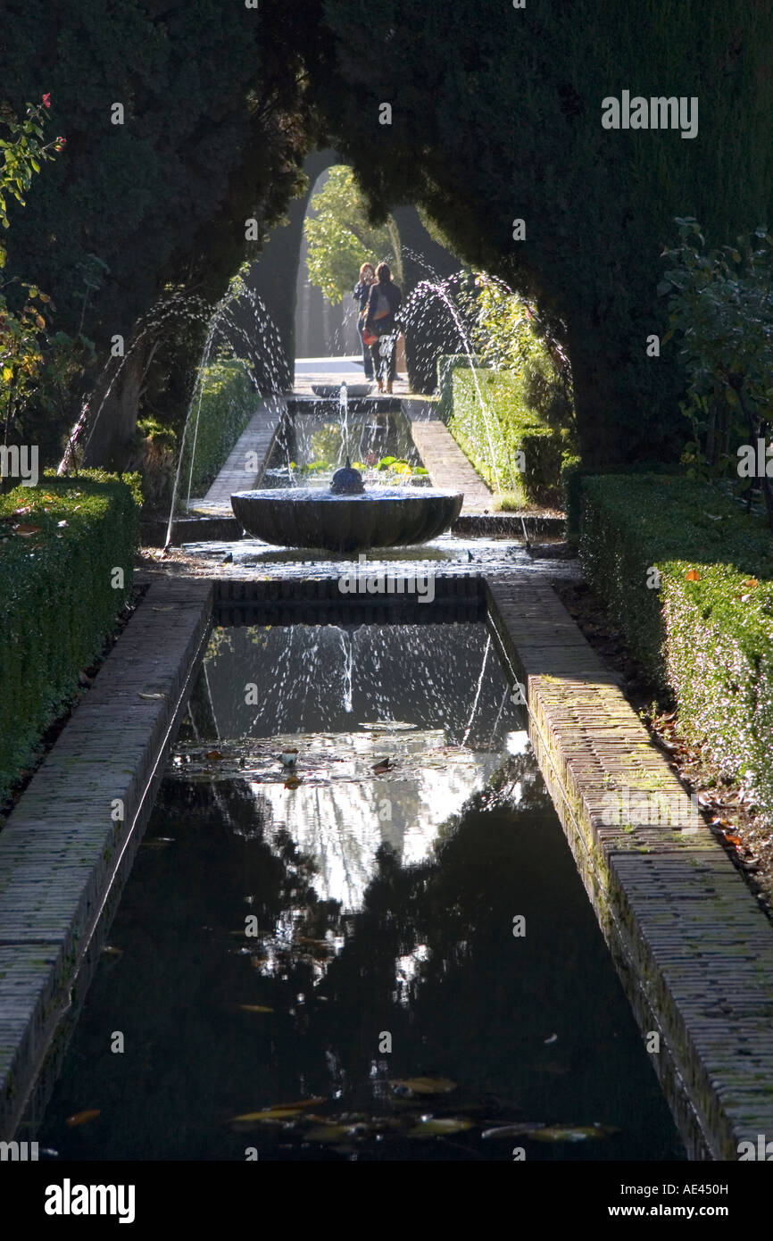 Water channel and fountain in the gardens of the Generalife, Alhambra ...