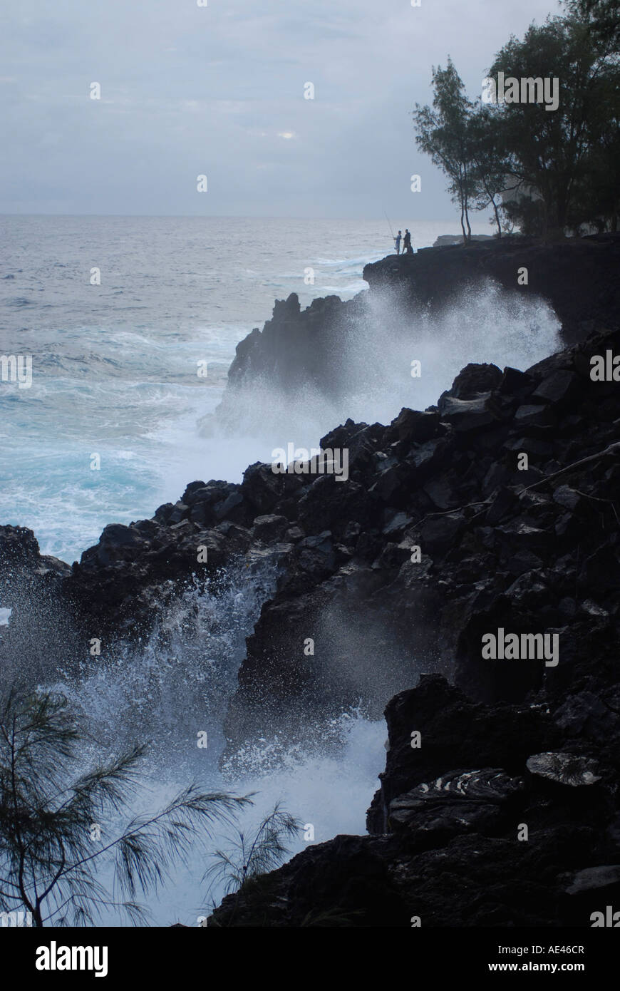 Two Hawaiians fish at Mackenzie State Park, Big Island, Hawaii ...