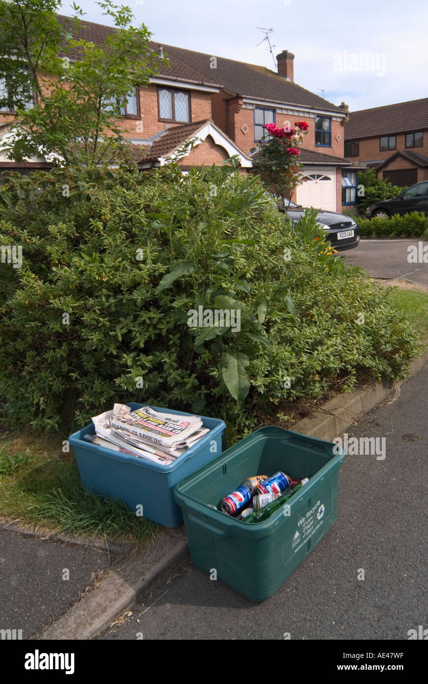 Recycling bins left out for collection in a suburban street in the uk ...