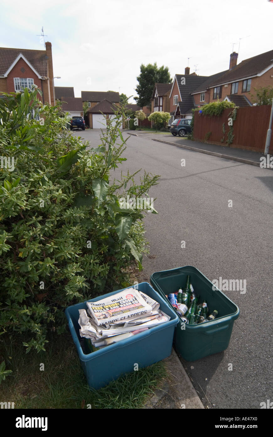 Recycling bins left out for collection in a suburban street in the uk ...