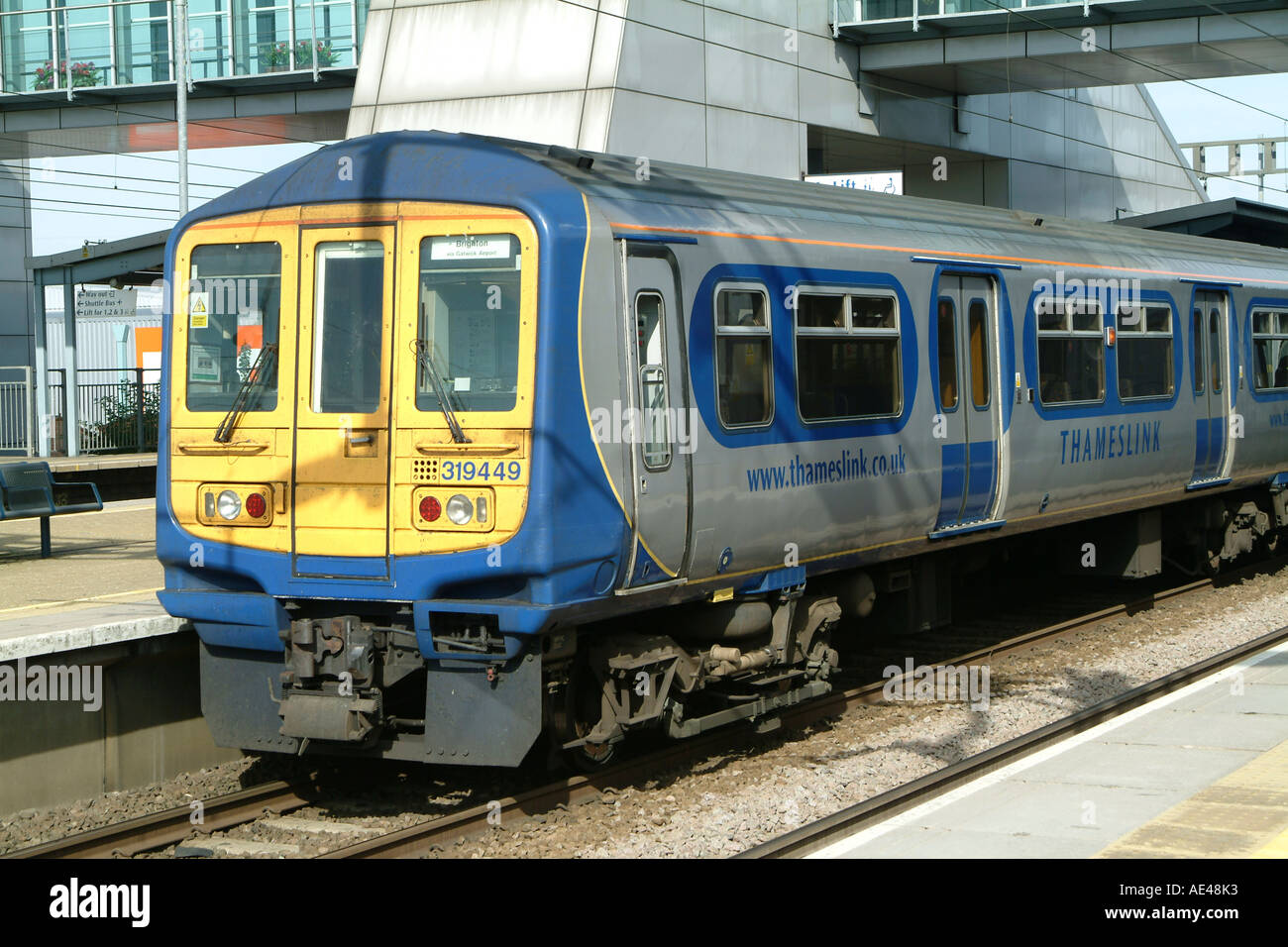 Thameslink class 319 passenger train at a railway station in the UK ...