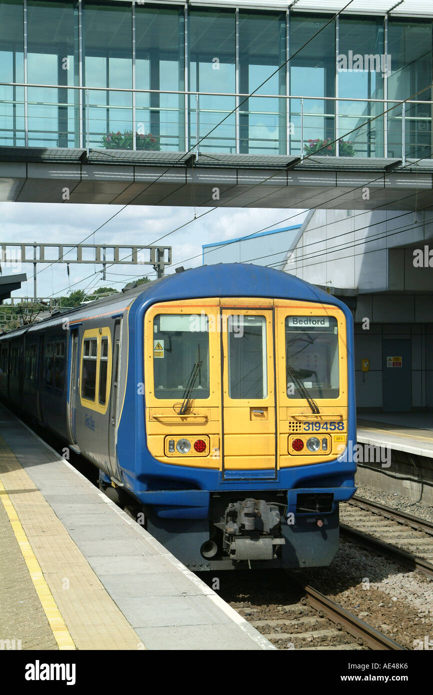 Thameslink class 319 passenger train at a railway station in the UK ...