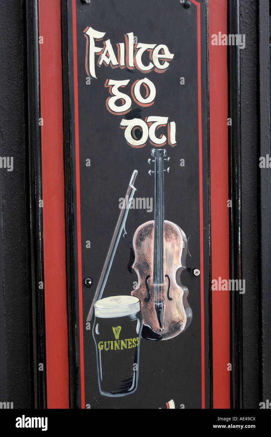 Typical Irish pub sign, Guinness and Fiddle, Lowery's pub, Clifden ...