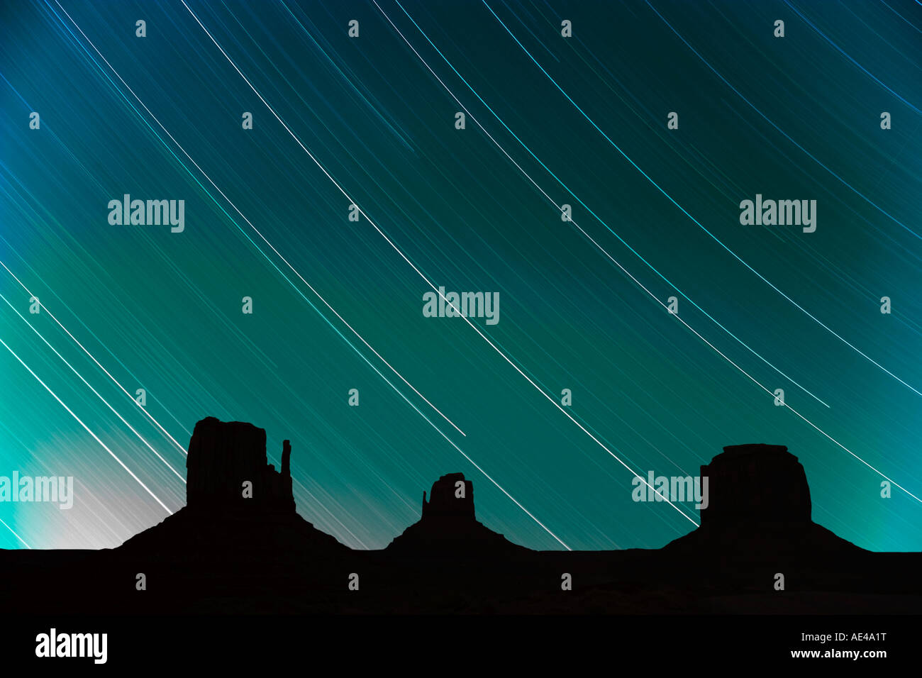 Long exposure of star trails in night sky, Monument Valley Navajo ...