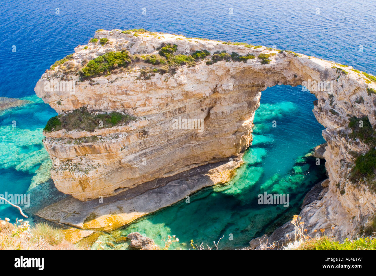 A view of the Trypitos Arch on the south coast of Paxos, Ionian Islands ...