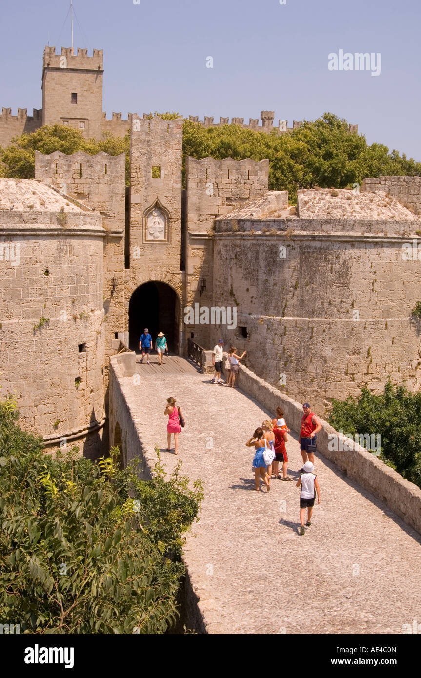 Tourists at the D'Amboise Gate and city walls around Rhodes Town ...