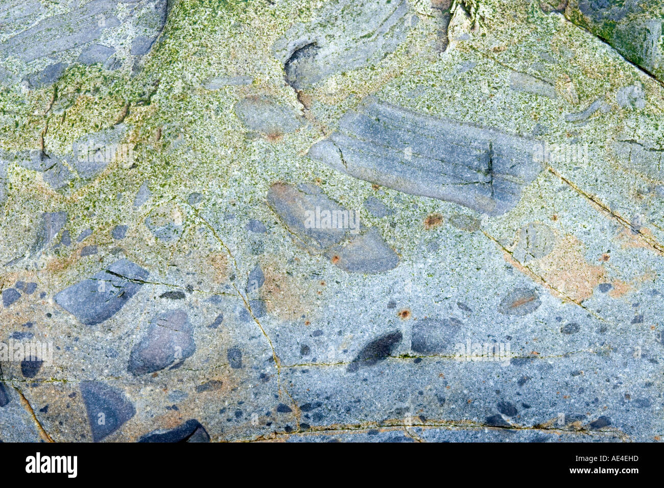 Rocks aggregated into a larger boulder Stock Photo - Alamy