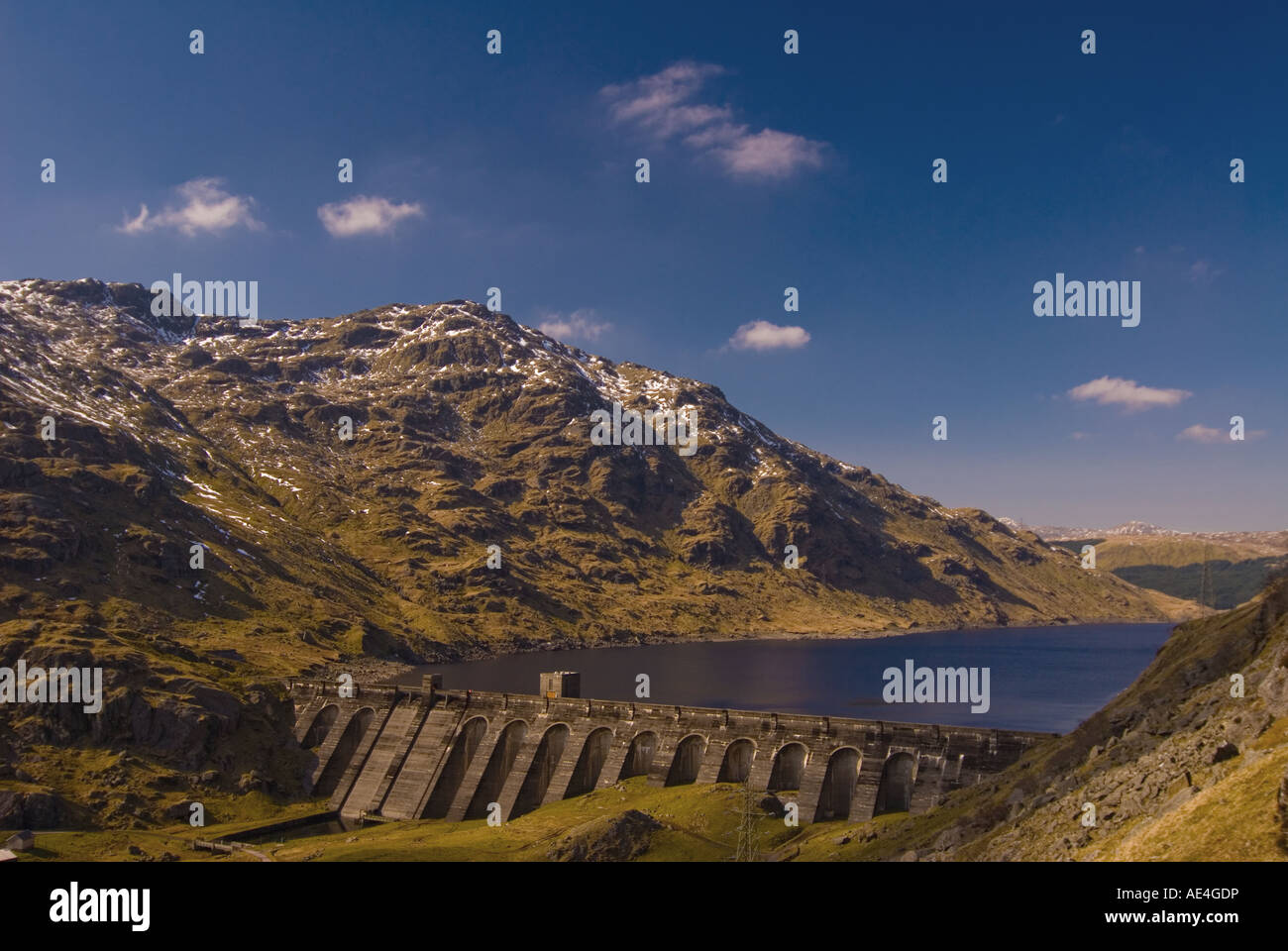 The Loch Sloy hydro Dam set in the heart of the Arrochar Alps with Bane ...