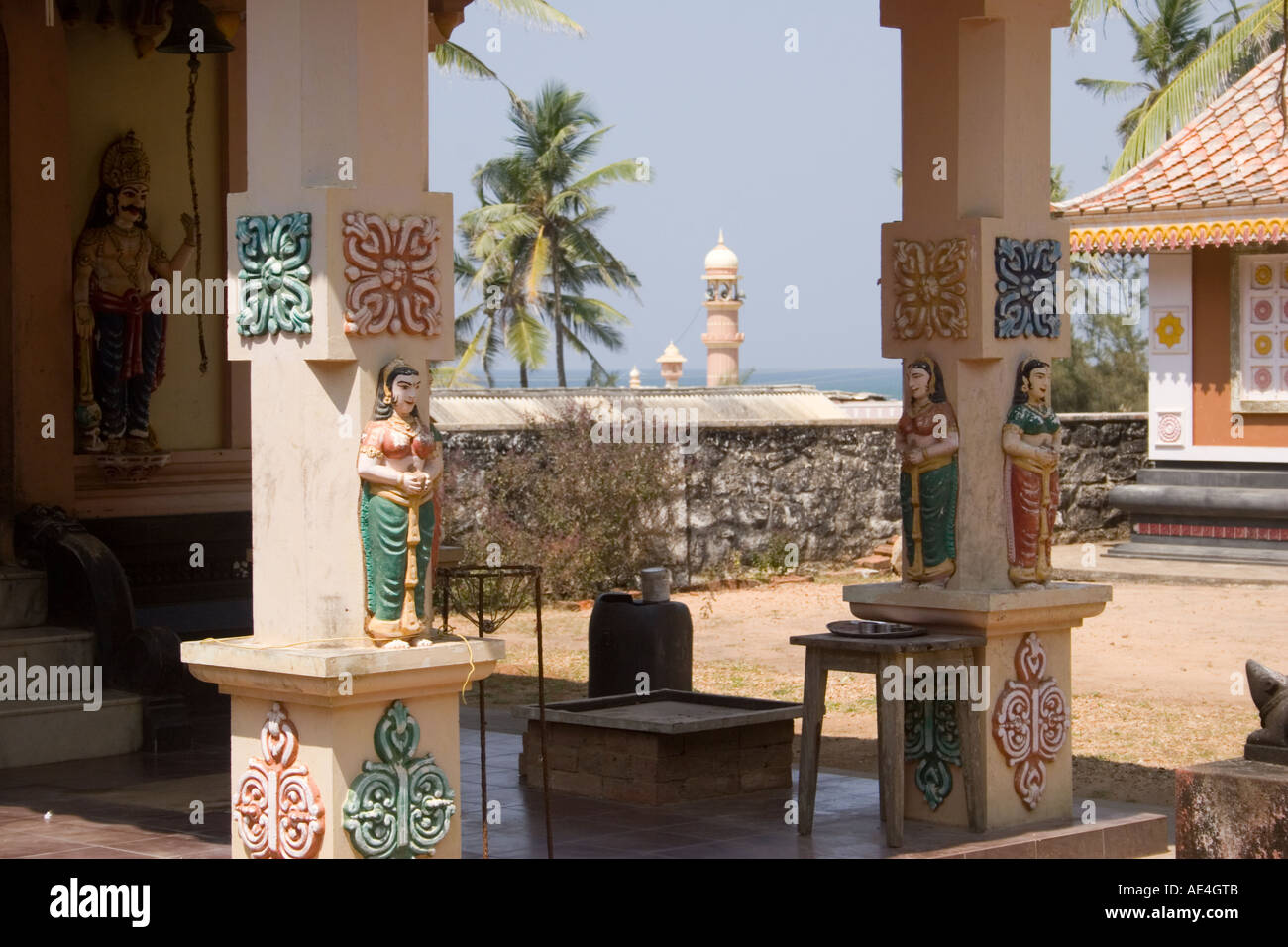 Hindu temple with mosque in background Kovalam beach Kerala India Stock ...