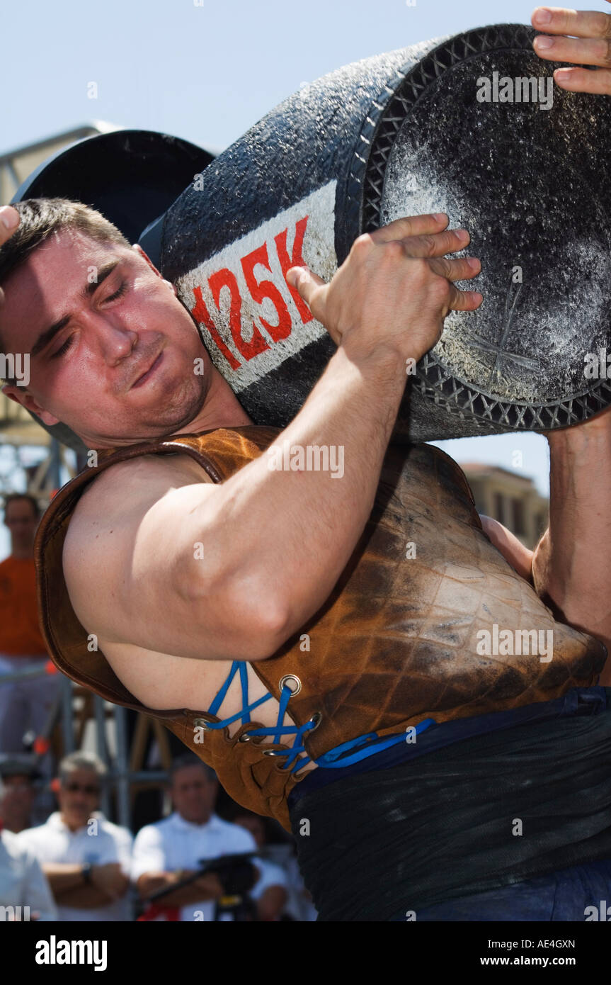 Weight lifting in strong man competition, during San Fermin, Running of ...