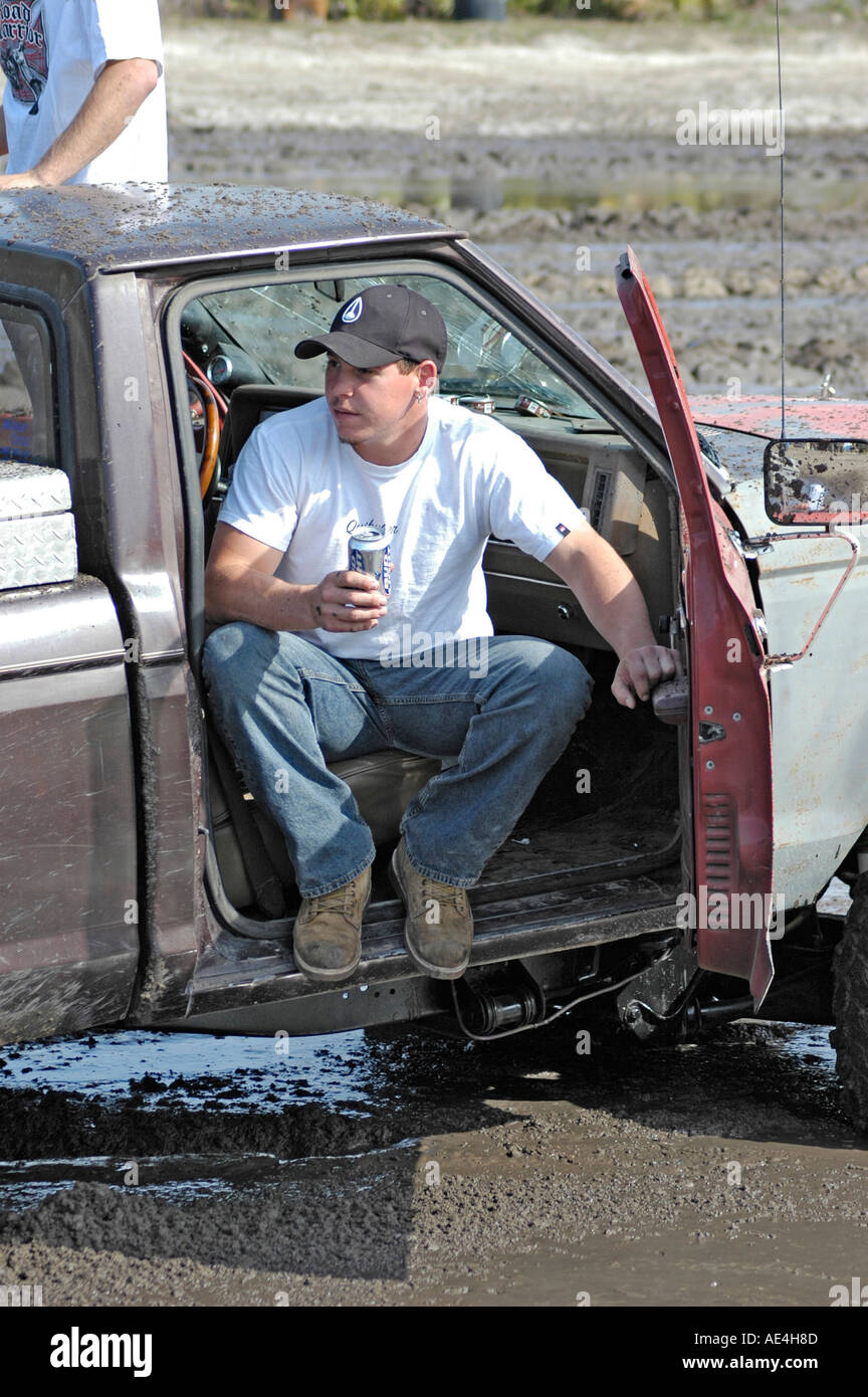 real muddy People with 4 wheeler and trucks on Sunday outing in the mud ...