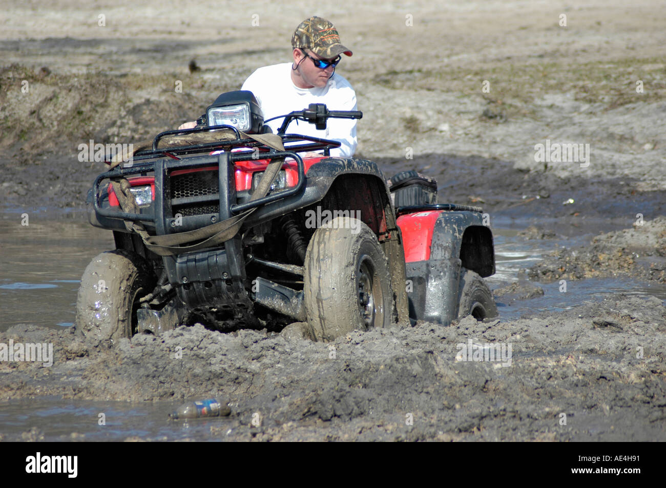 real muddy People with 4 wheeler and trucks on Sunday outing in the mud ...