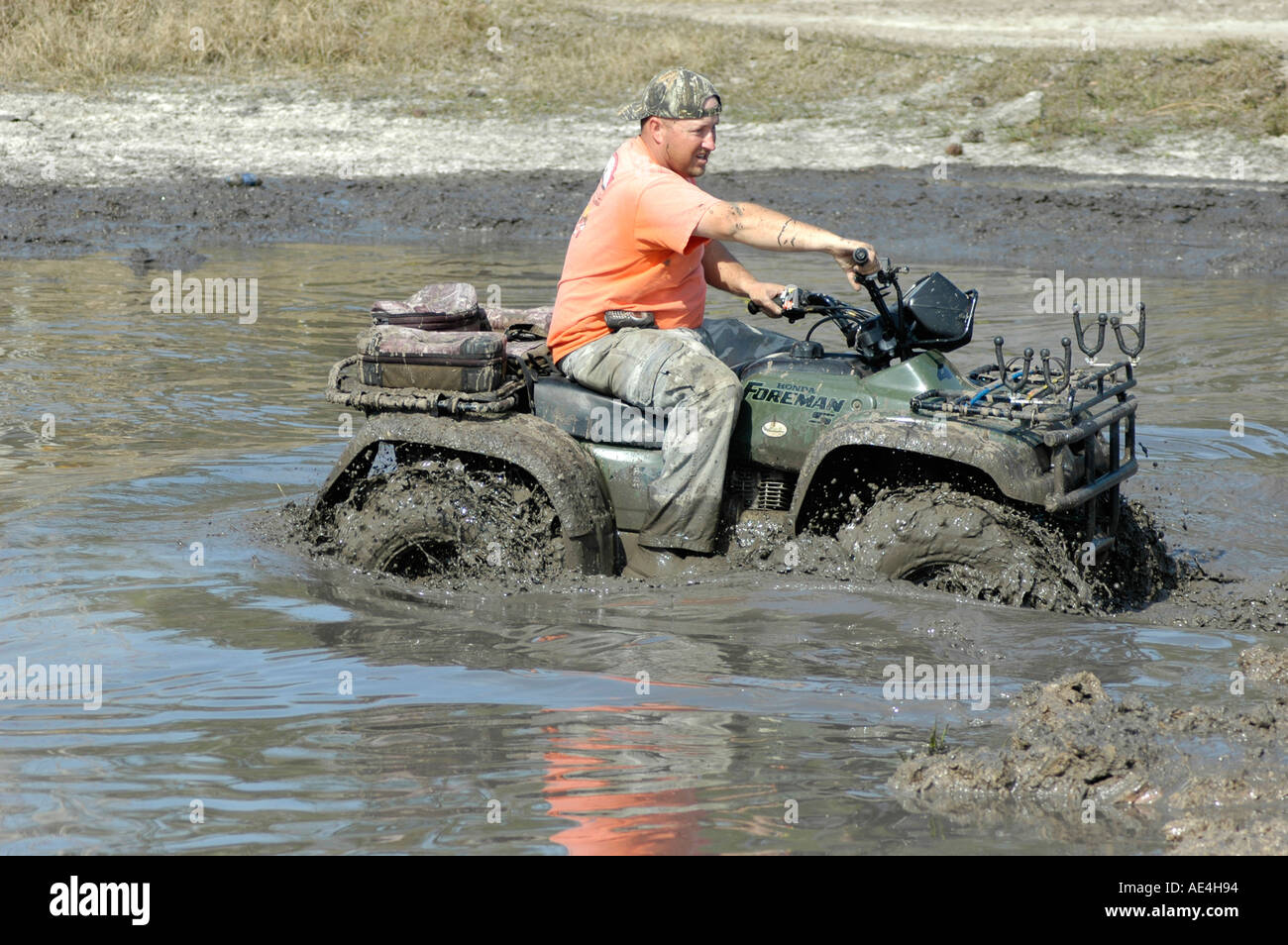 real muddy People with 4 wheeler and trucks on Sunday outing in the mud ...