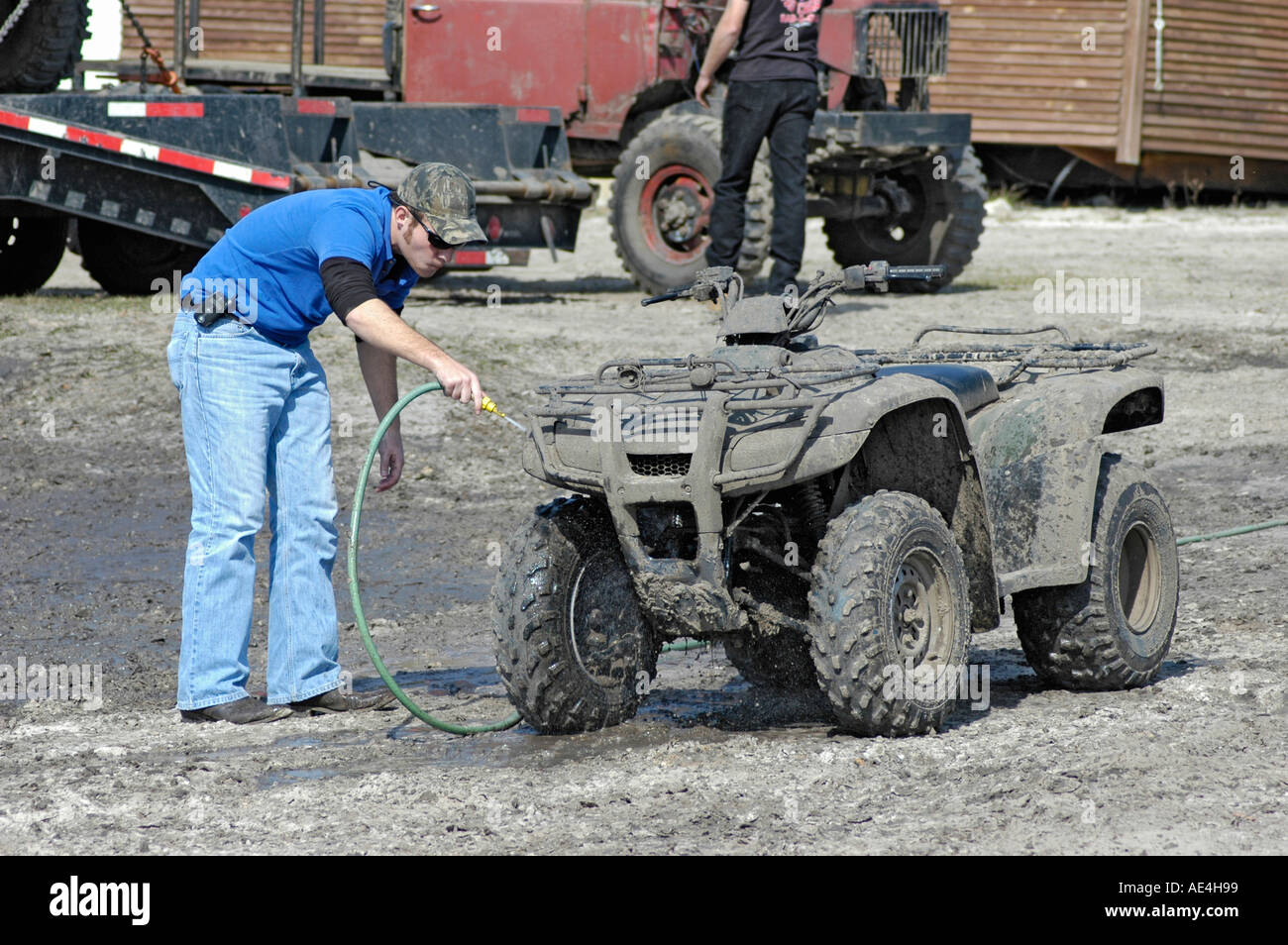 real muddy People with 4 wheeler and trucks on Sunday outing in the mud ...