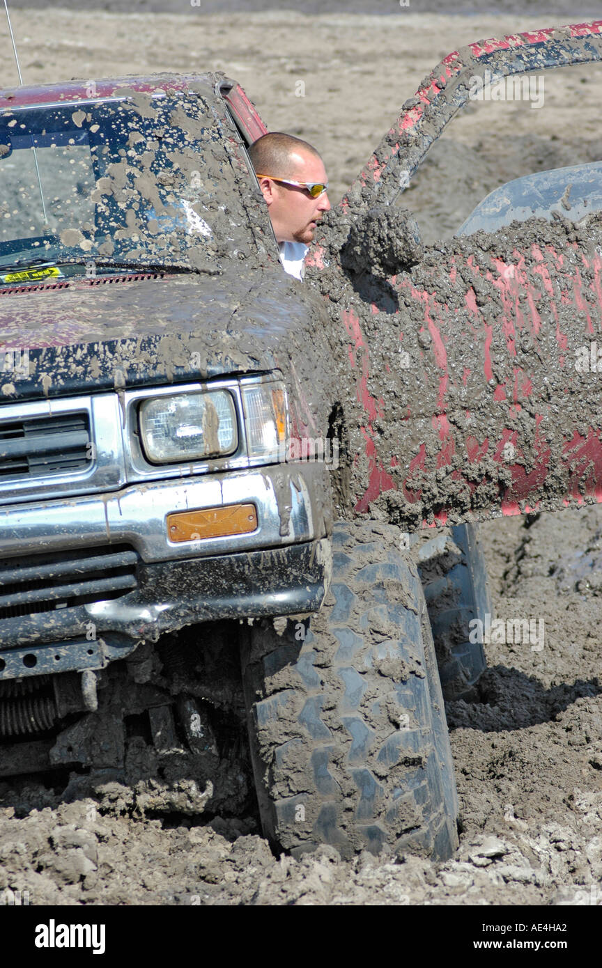 real muddy People with 4 wheeler and trucks on Sunday outing in the mud ...