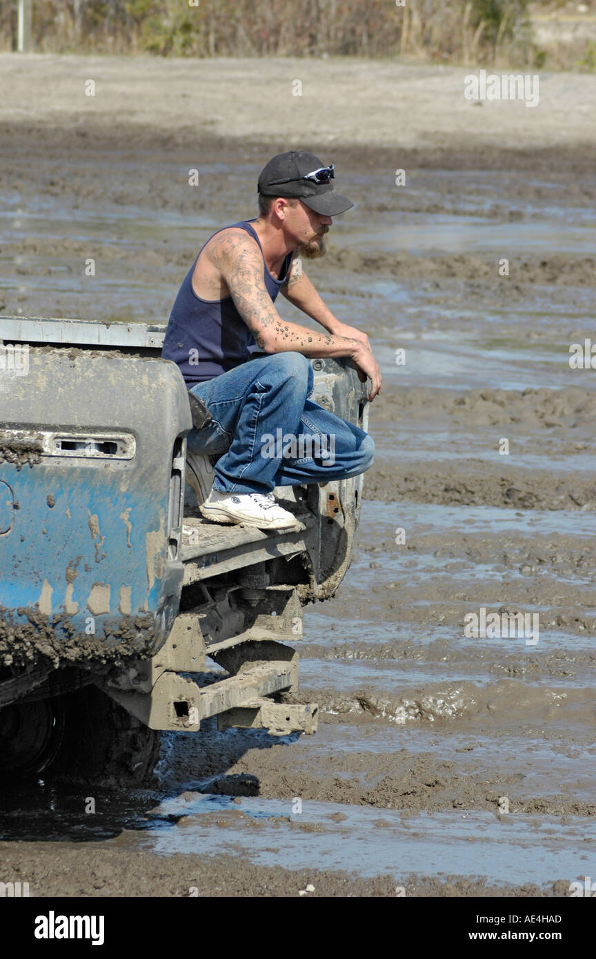 real muddy People with 4 wheeler and trucks on Sunday outing in the mud ...