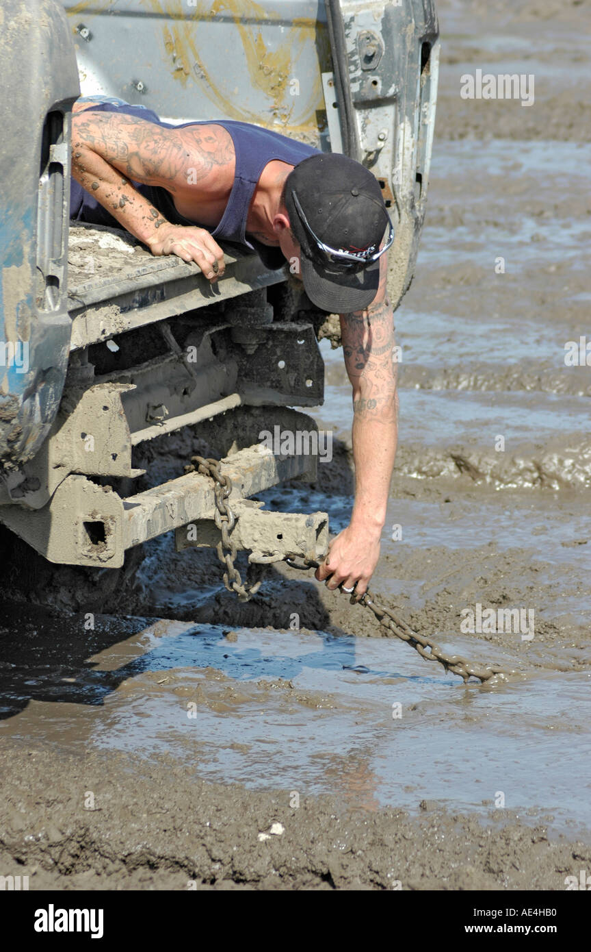 real muddy People with 4 wheeler and trucks on Sunday outing in the mud ...