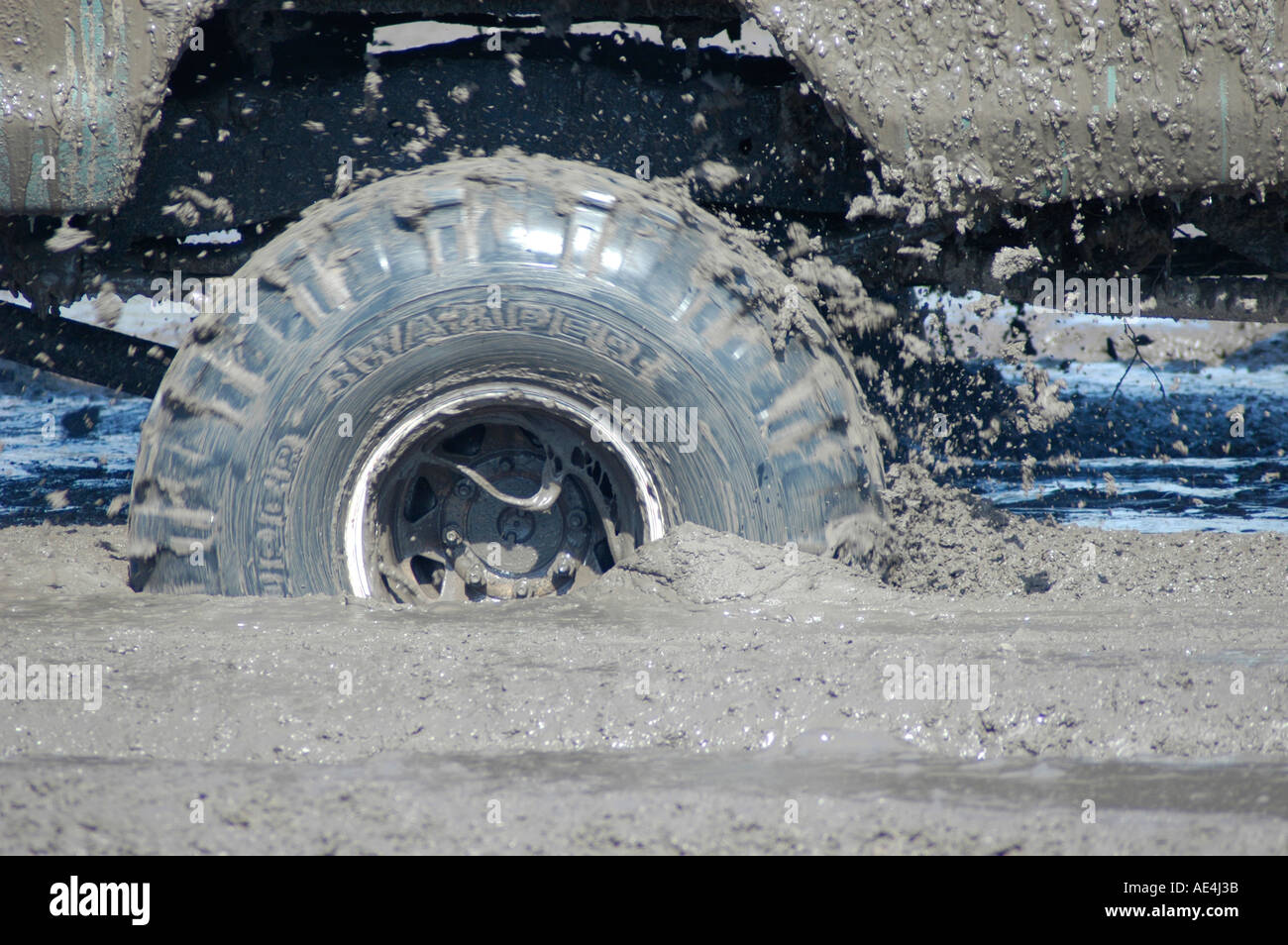 Real people with 4 wheeler and trucks on Sunday outing in the mud for ...