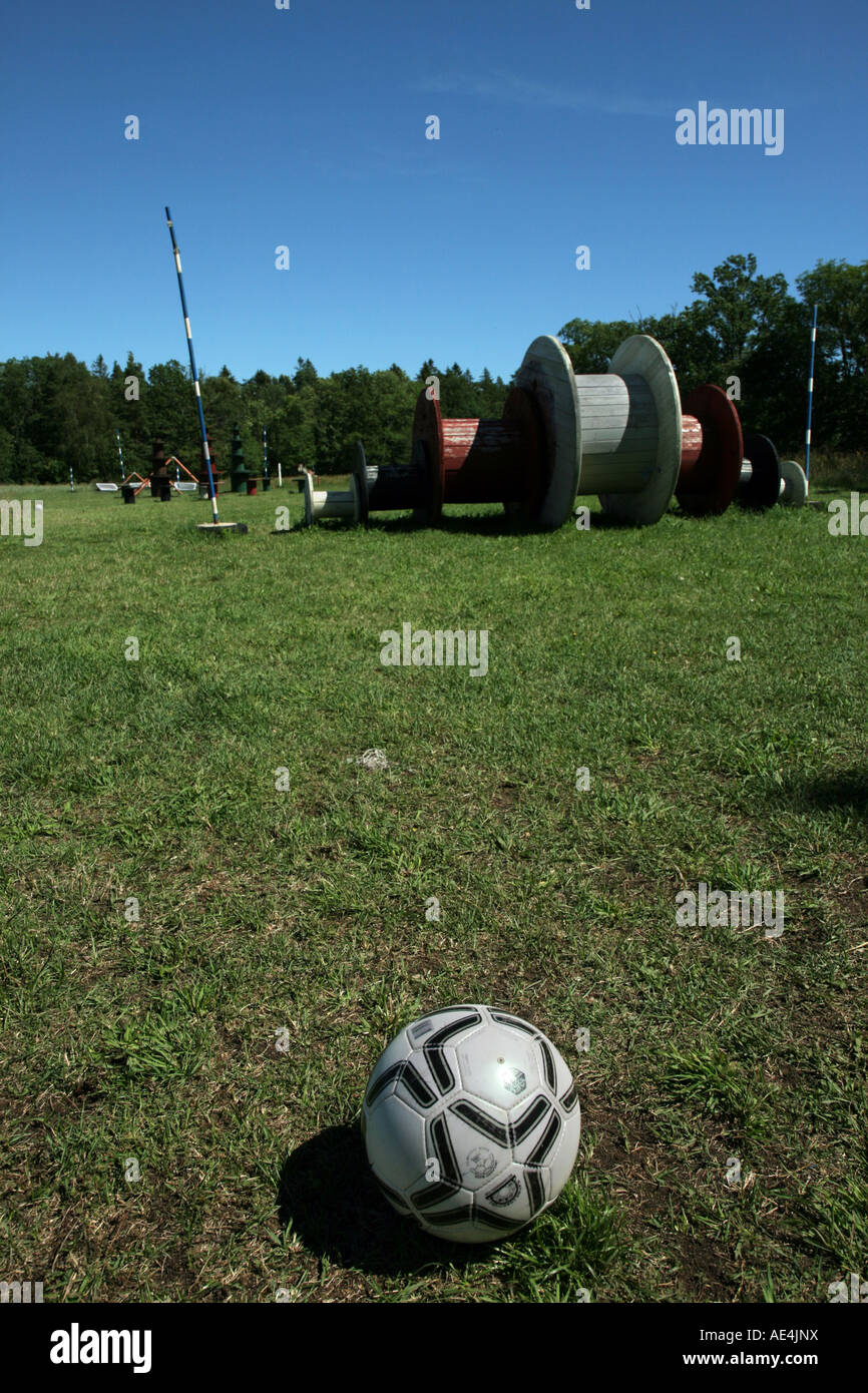 Playing football golf by kicking a football around an 18 hole course ...