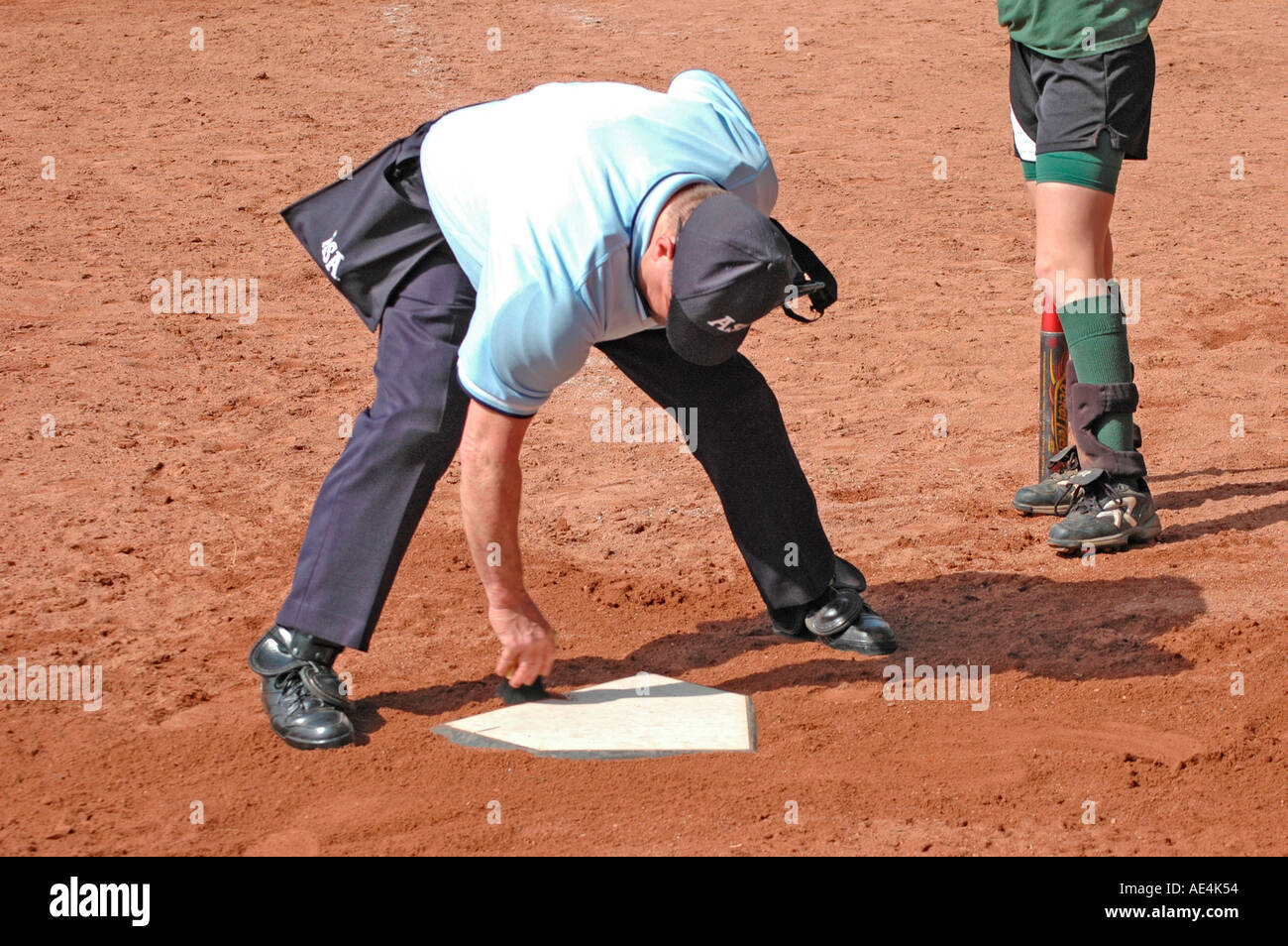 Youth and coaches on sports fields during spring sports being coached ...