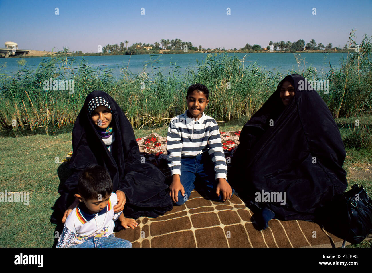 Family group beside the Tigris River, Iraq, Middle East Stock Photo - Alamy