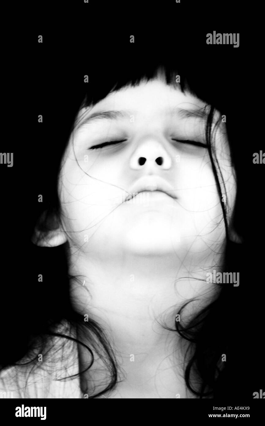 young girl with eyes closed and face up Stock Photo - Alamy