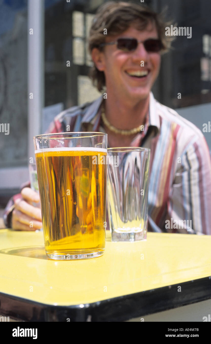 Carefree man drinking alcohol work hi-res stock photography and images ...