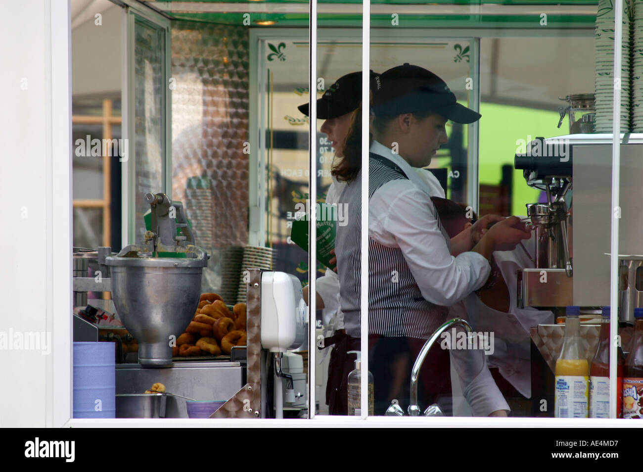 Girls working in a mobile fast food trailer at a shopping center Stock ...