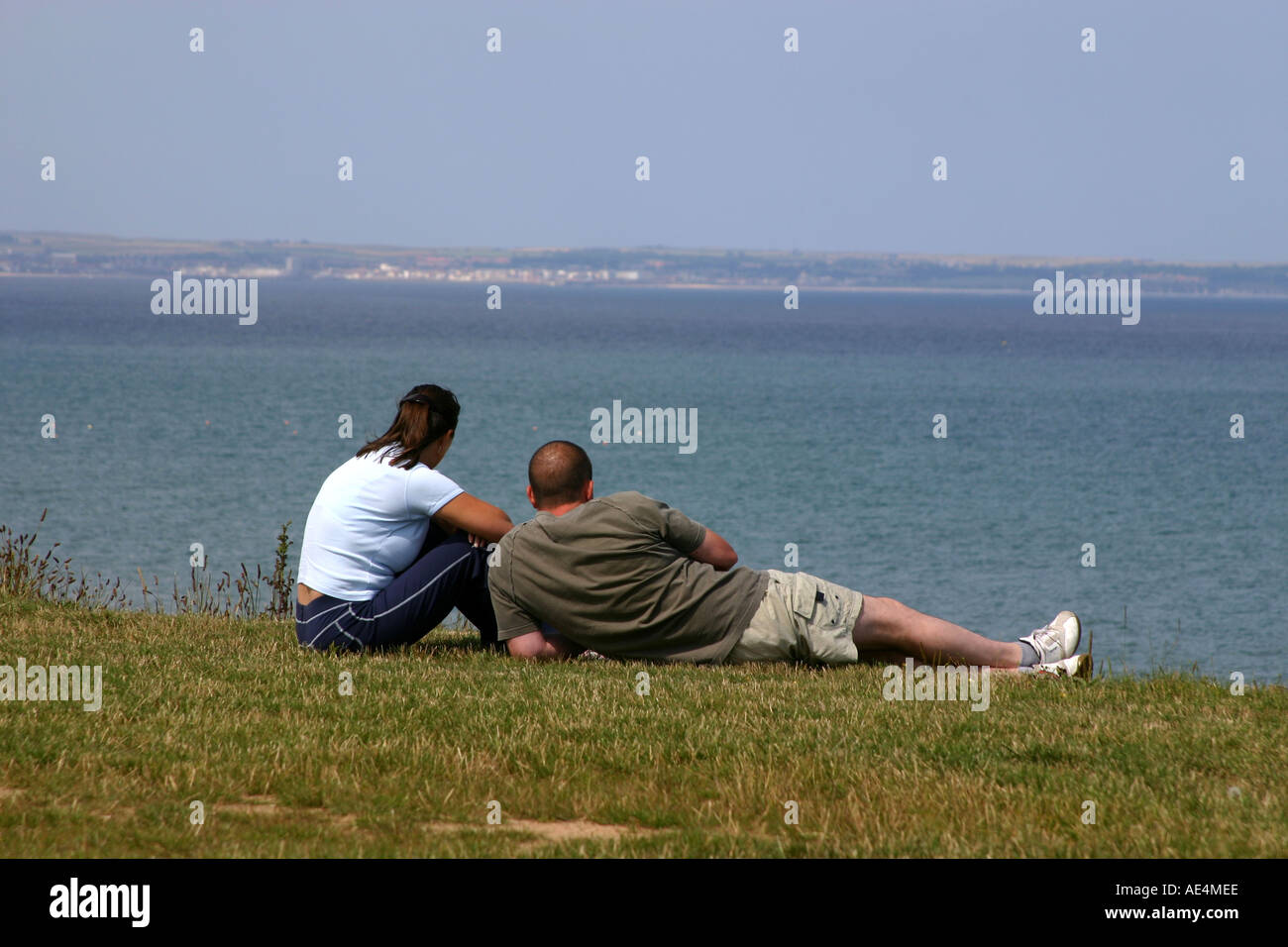 Woman beach top view laying hi-res stock photography and images - Alamy