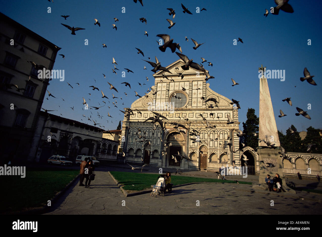 Pigeons in flight in the Piazza Santa Maria Novella, Florence, Tuscany ...