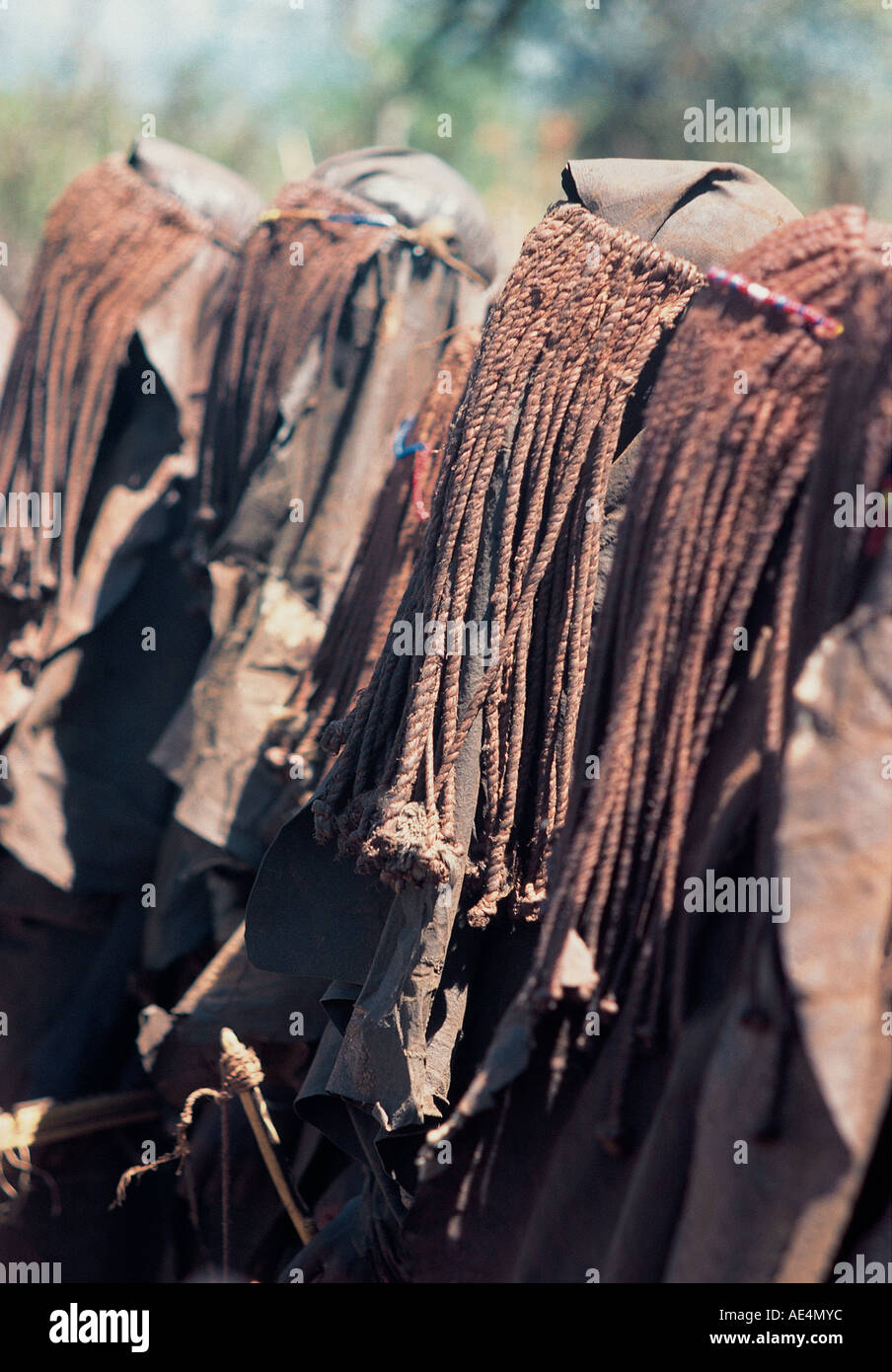 Young Pokot men wearing string masks during SAPANA initiation ceremony ...