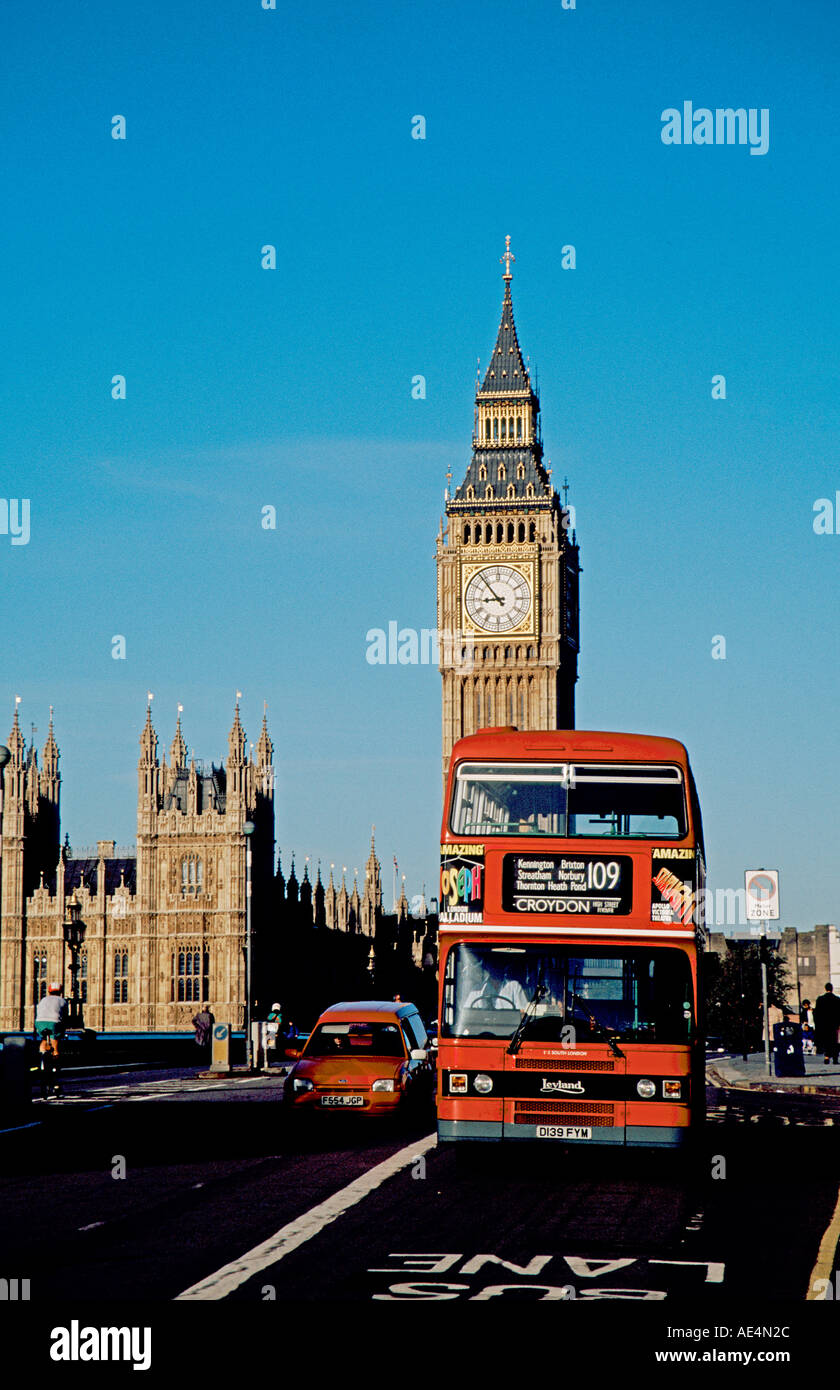 Red double decker bus coming over Westminster Bridge in 1990s with ...